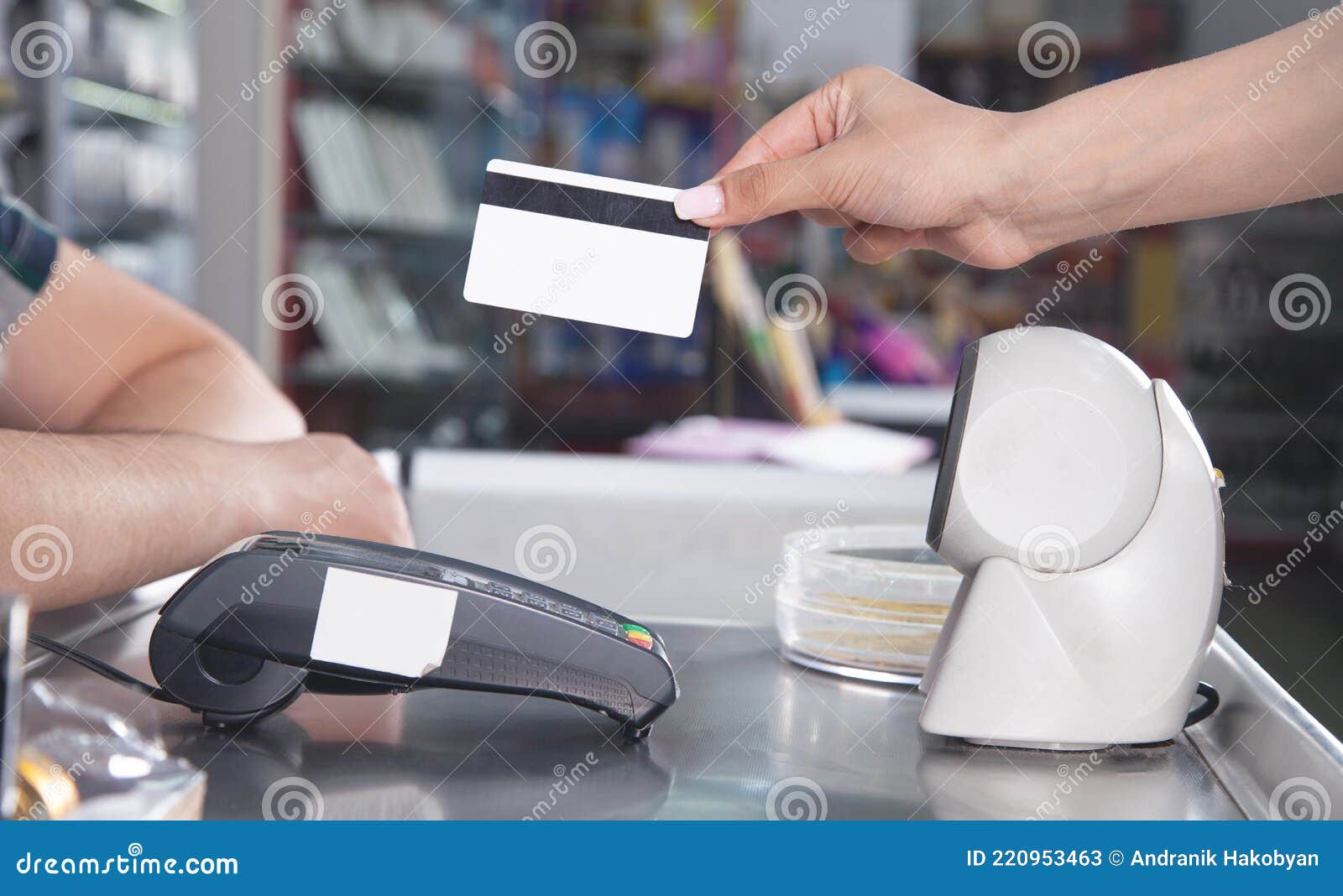 Customer Making Payment Using Credit Card in a Supermarket Stock Image ...