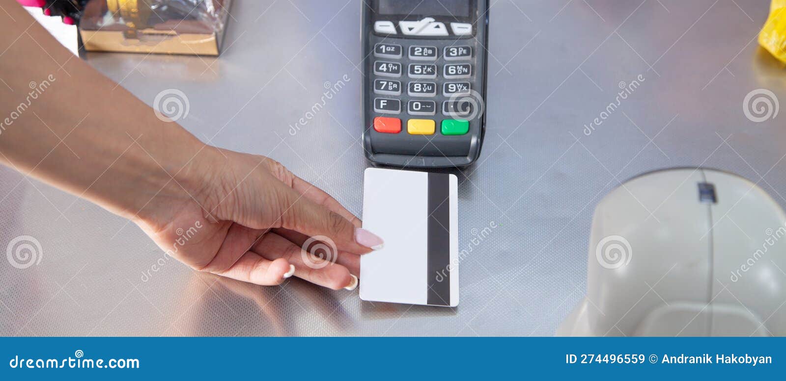 Customer Making Payment Using Credit Card in a Supermarket Stock Image ...