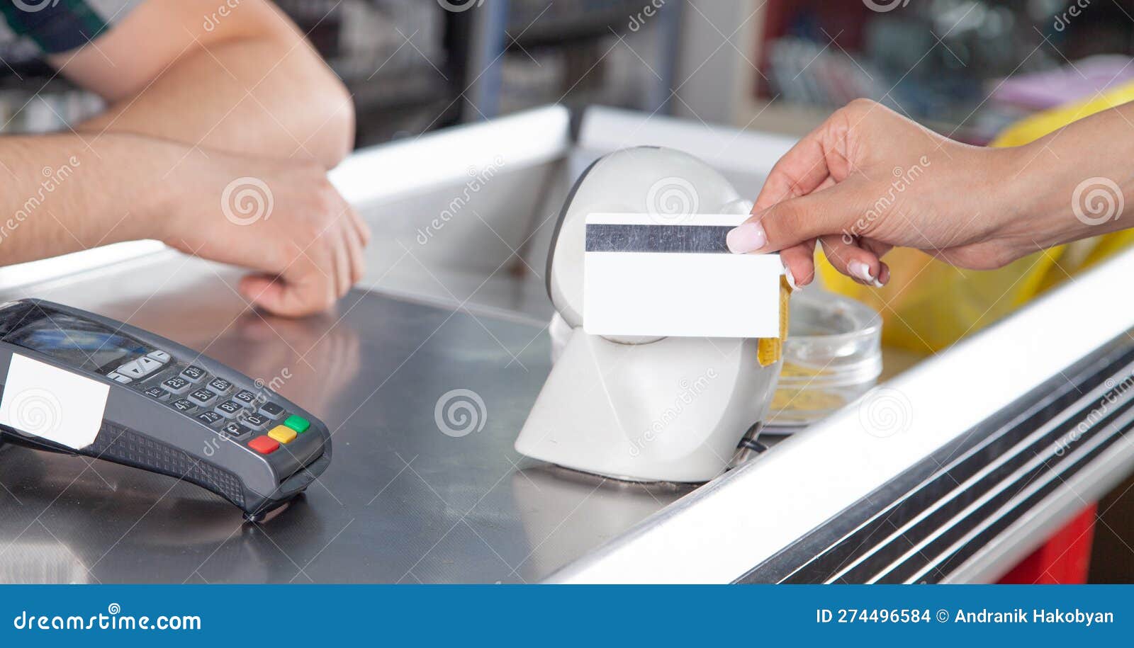 Customer Making Payment Using Credit Card in a Supermarket Stock Photo ...