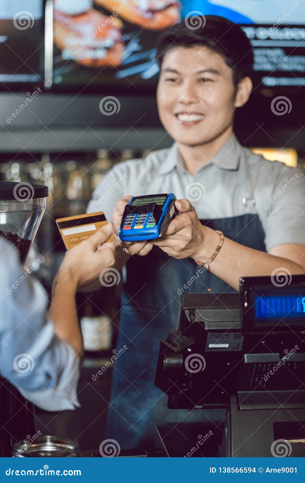 Customer Making Wireless Payment Using Credit Card Stock Photo - Image ...