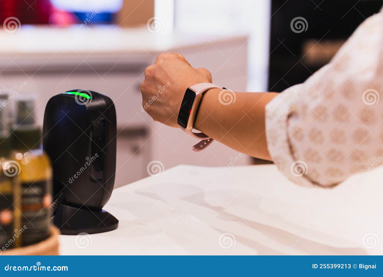 Customer Making Wireless Payment Using Smartwatch at Shopping Store ...
