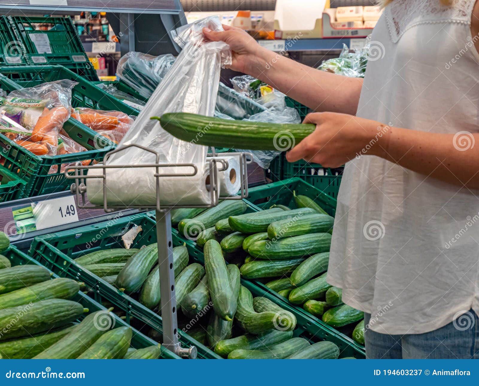 Customer is Packing Cucumber in Plastic Bag Stock Image - Image of ...