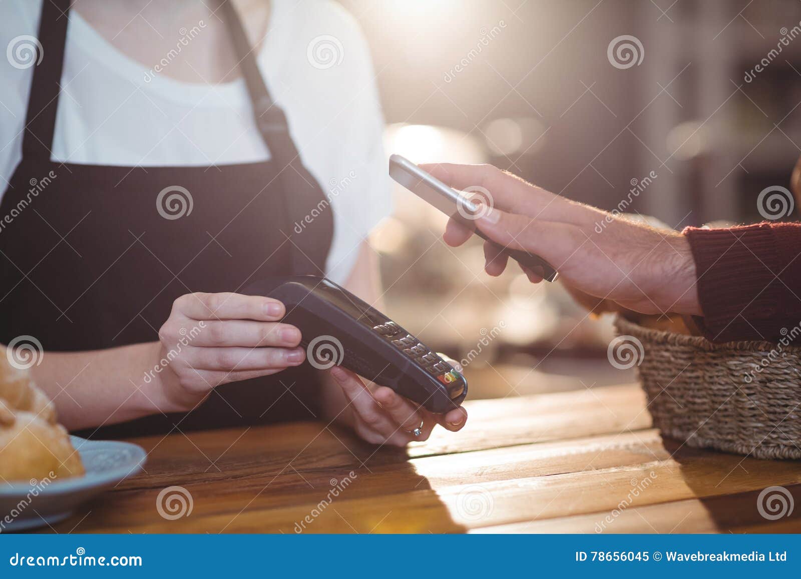 Customer Paying Bill through Smartphone Using NFC Technology Stock ...