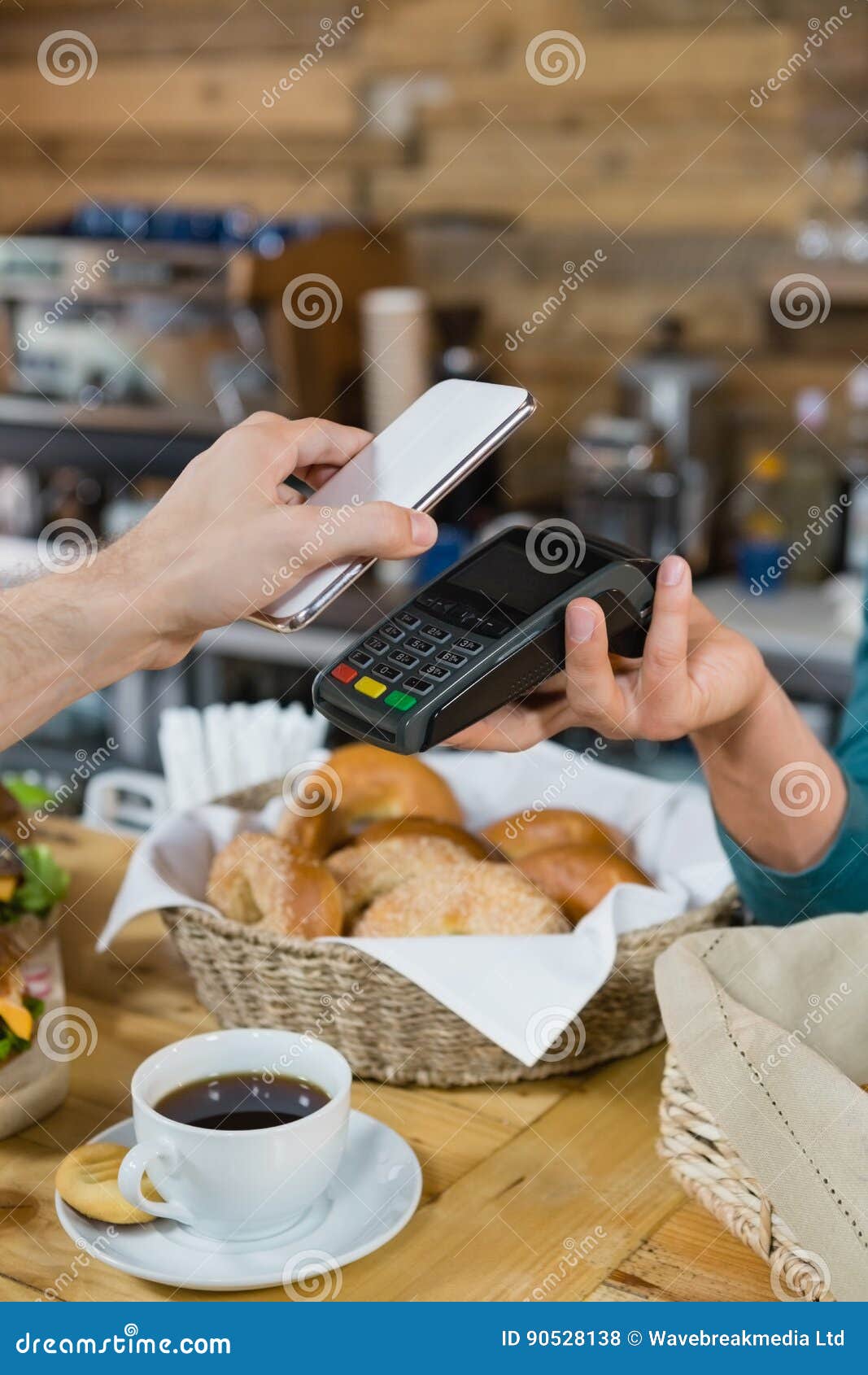 Customer Paying Bill through Smartphone Using NFC Technology at Counter ...