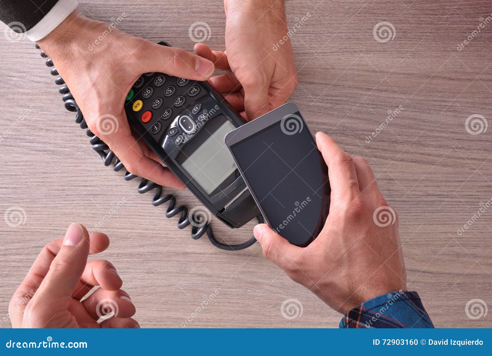 Customer Paying a Merchant with Mobile Phone Stock Photo - Image of ...