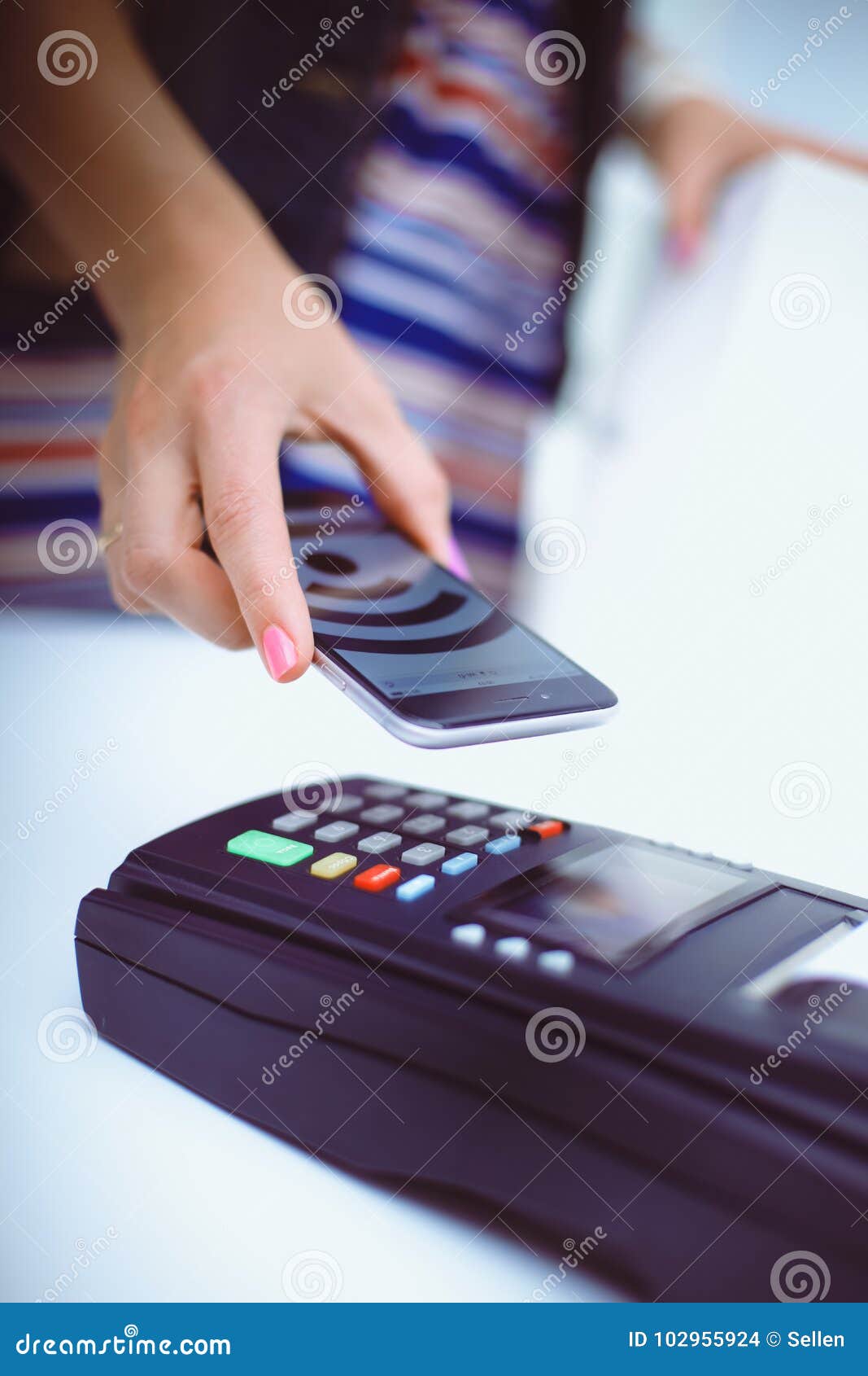 Customer is Paying with Smartphone in Shop Using NFC Technology. NFC ...