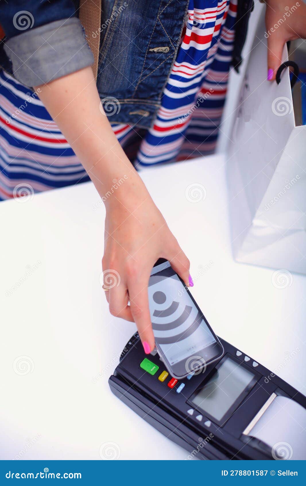 Customer is Paying with Smartphone in Shop Using NFC Technology. NFC ...