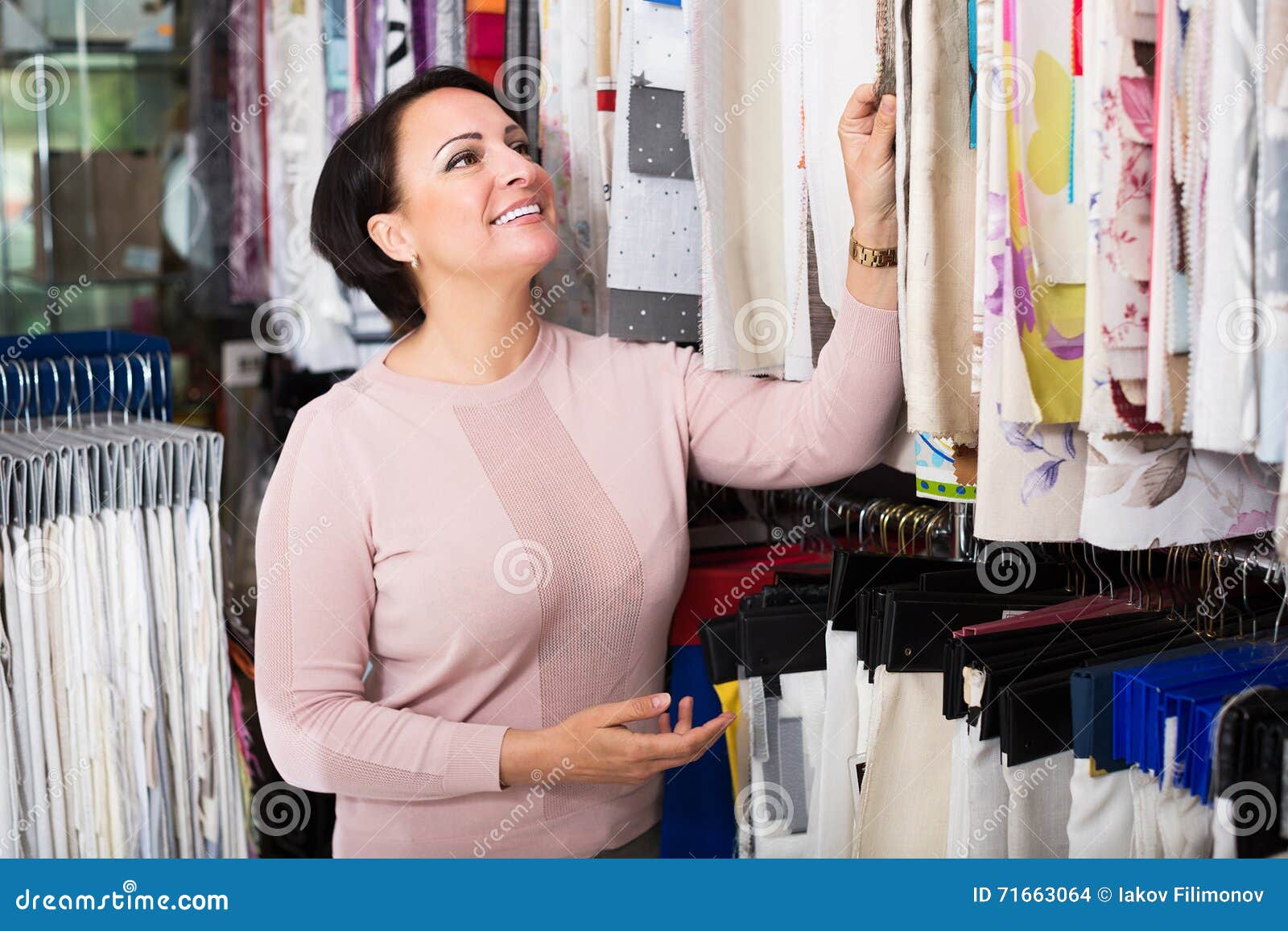 Customer Posing Near Cloth Rolls Stock Photo - Image of dark, european ...