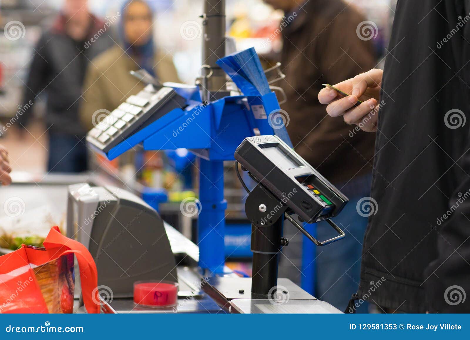 Customer Purchasing Using the Point of Sale Credit or Debit Card Reader ...