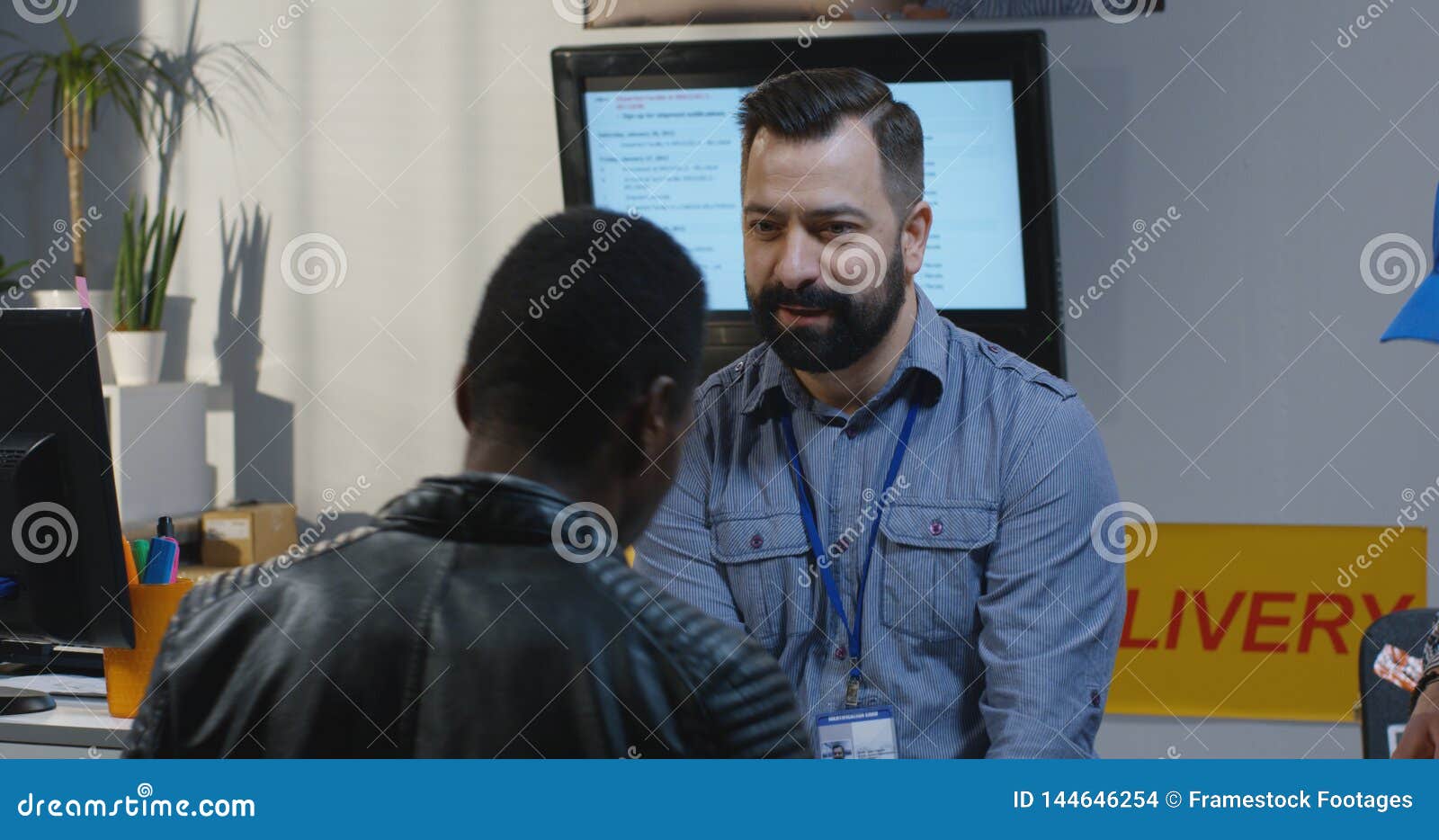 Customer Receiving Package at a Customer Service Desk Stock Photo ...