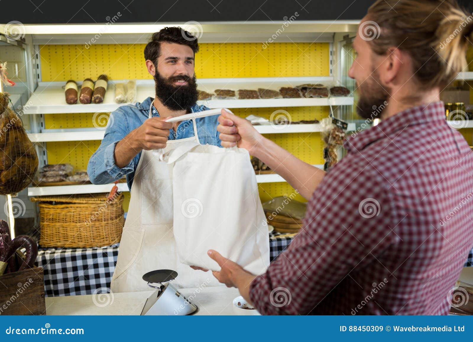 Customer Receiving Parcel at Meat Counter Stock Image - Image of ...