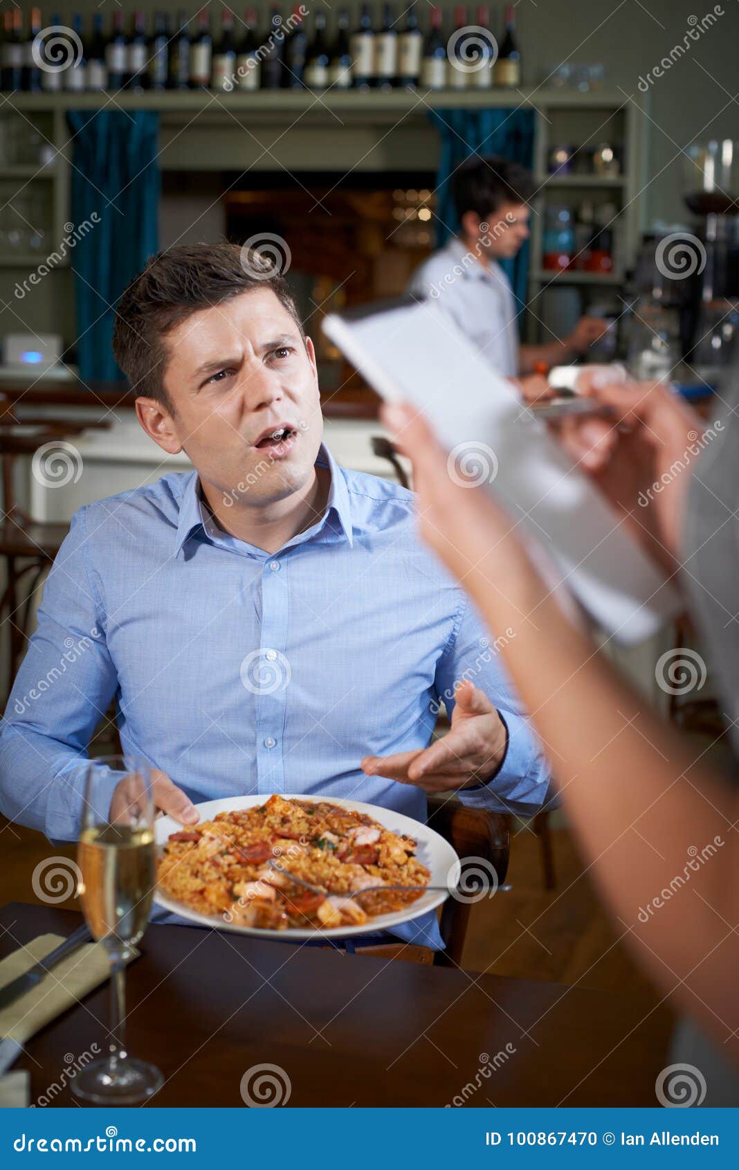 Customer in Restaurant Complaining To Waitress about Food Stock Photo ...