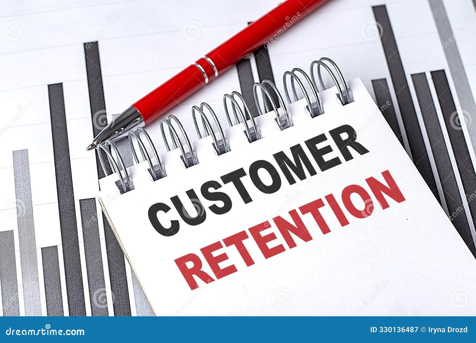 CUSTOMER RETENTION Text on Notebook on Chart with Pen Stock Image ...