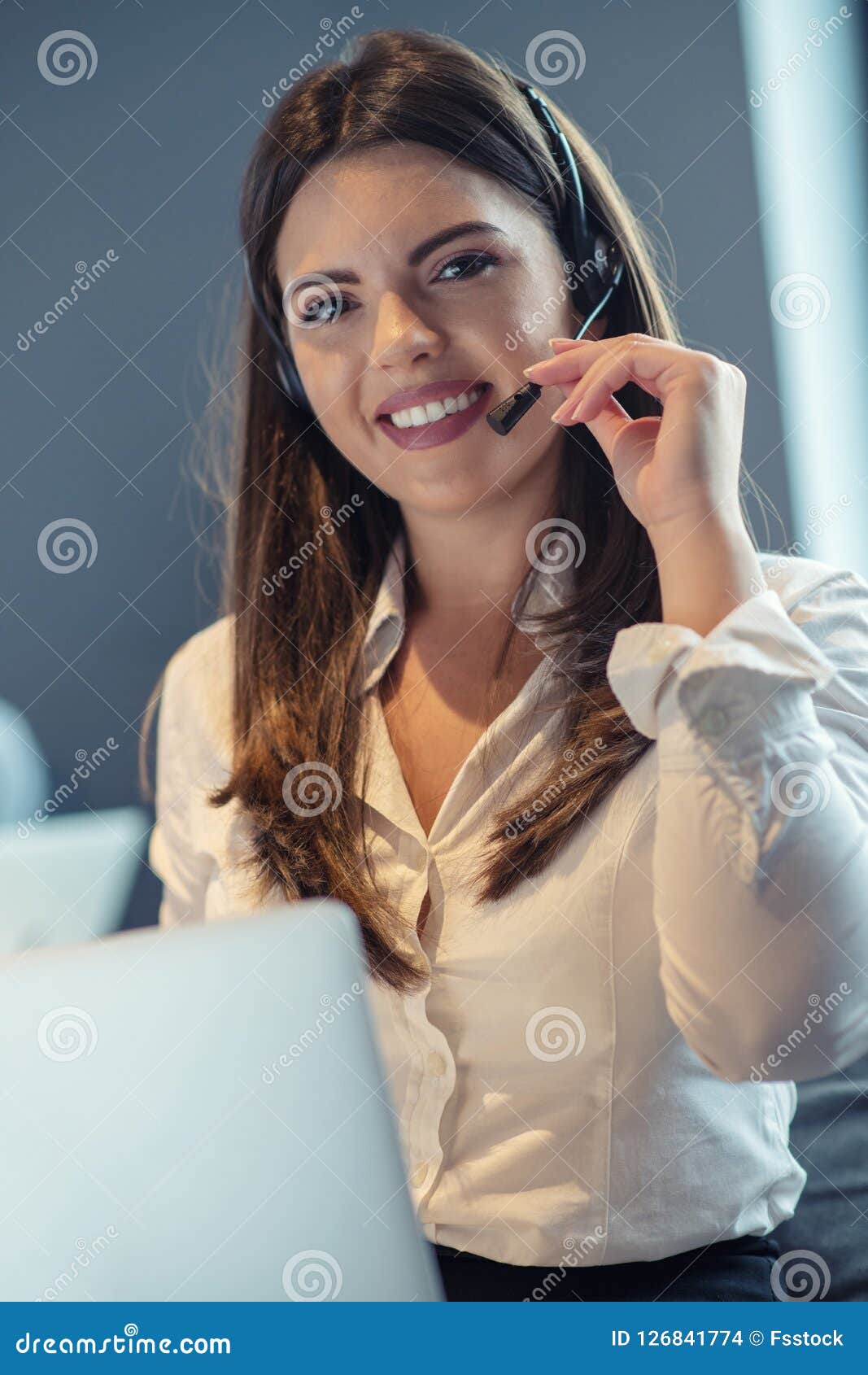 Customer Service Agent in an Startup Office with Laptop Stock Photo ...