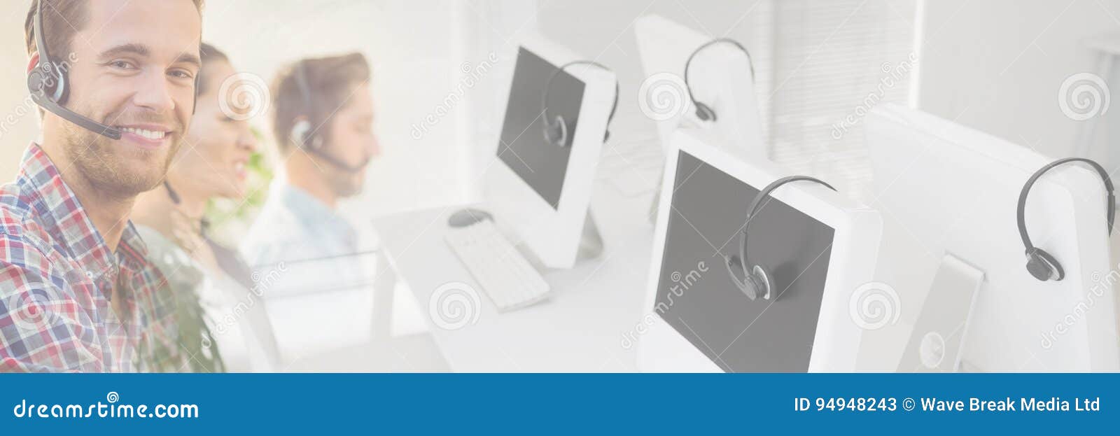 Customer Service Assistants with Headsets with Bright Office Background ...