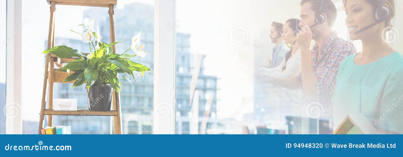 Customer Service Assistants with Headsets with Bright Office Background ...
