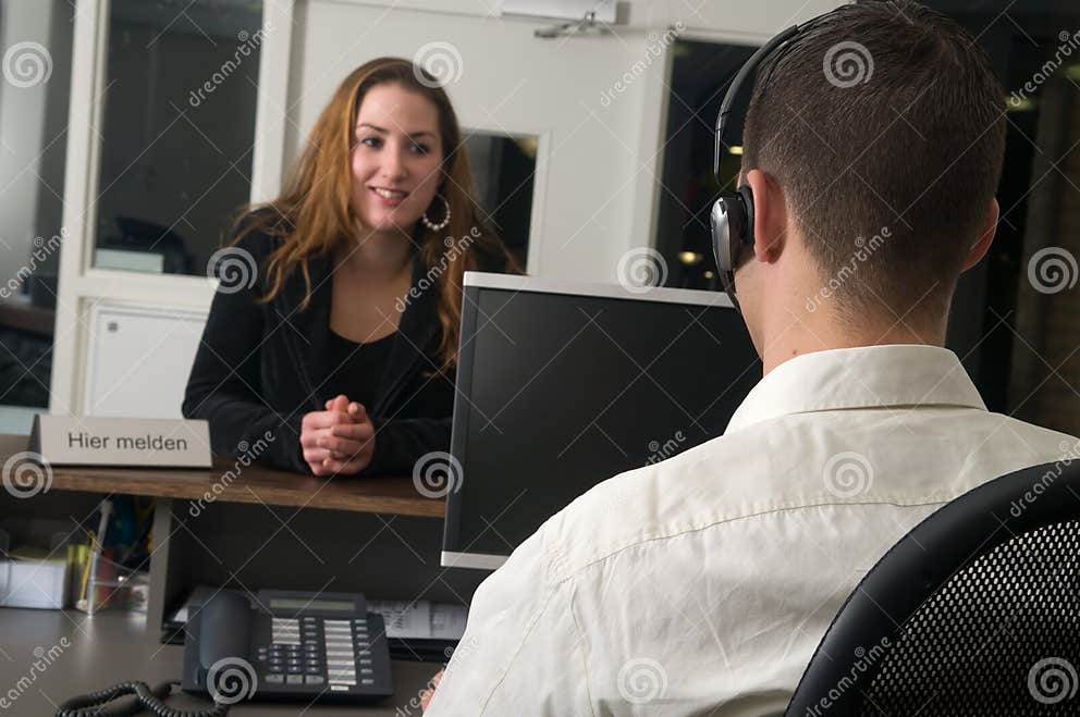 Customer at a service desk stock image. Image of businesspeople - 22929461