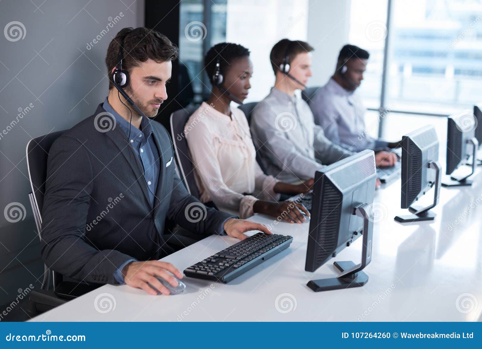 Customer Service Executives Working at Office Stock Photo - Image of ...