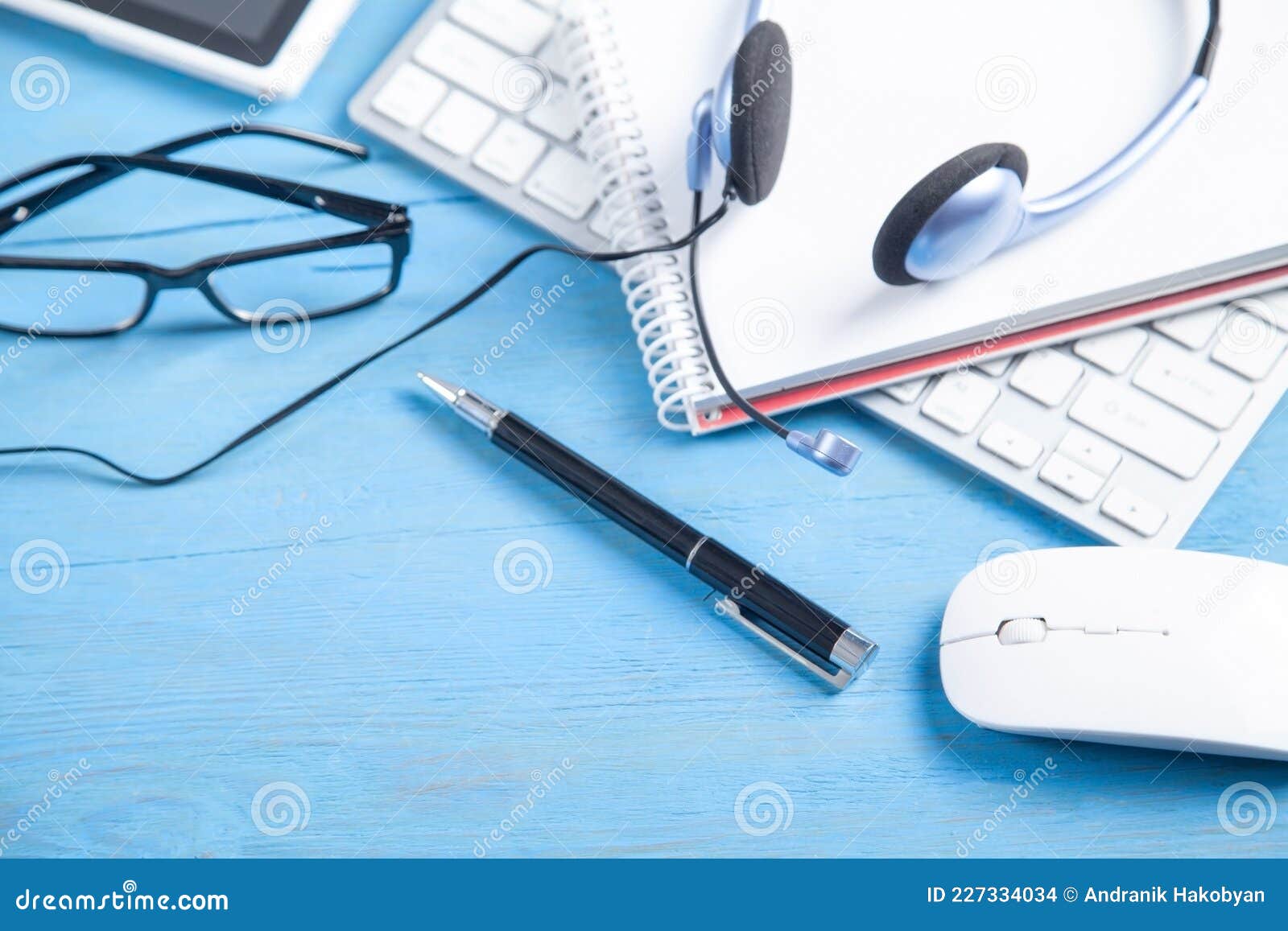 Customer Service Headset, Computer Keyboard and Business Objects on the ...