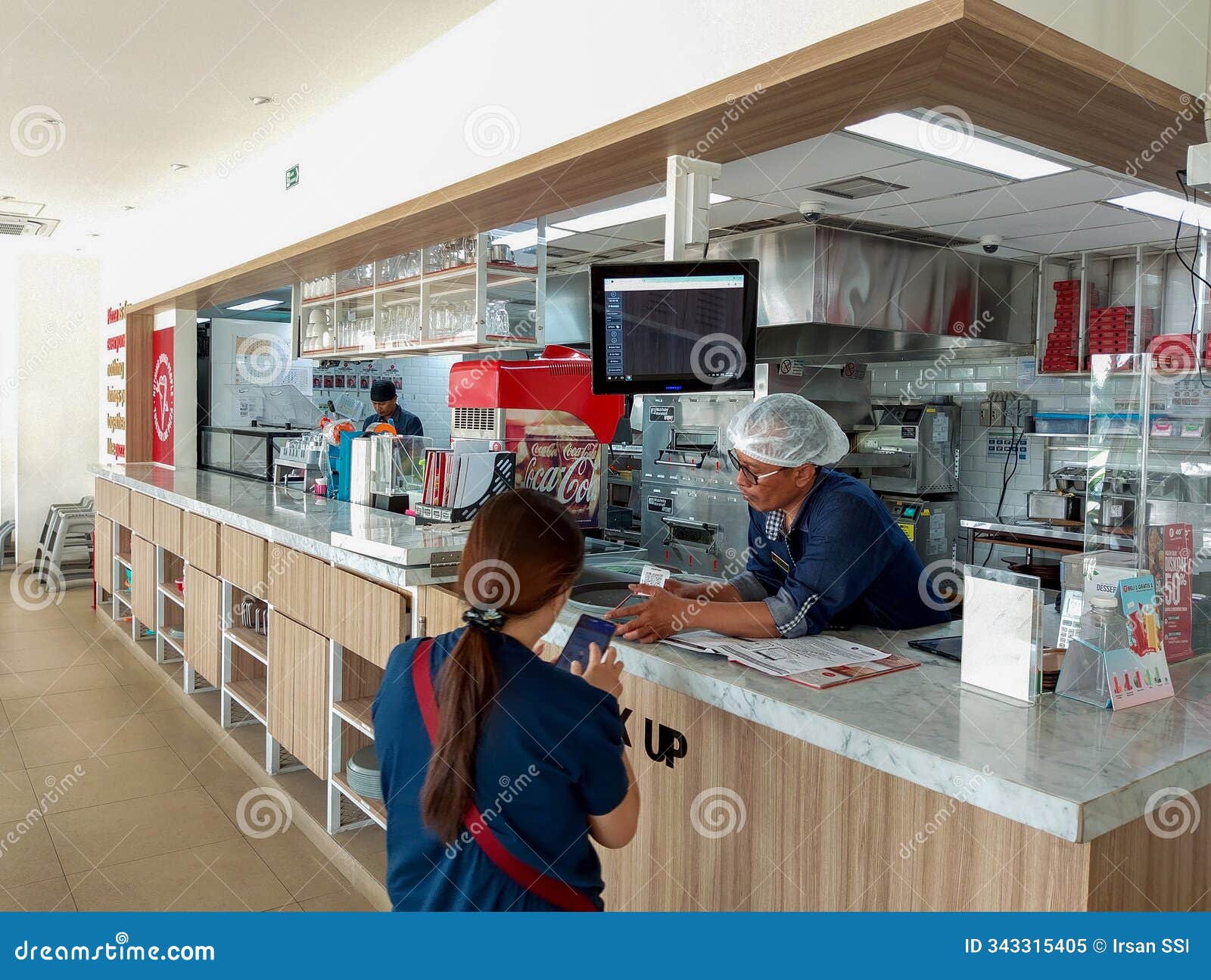 Customer Service Interaction at a Modern Fast Food Restaurant Counter ...