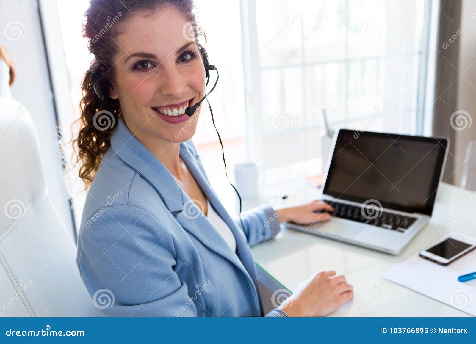 Customer Service Operator Talking on Phone in the Office. Stock Image ...