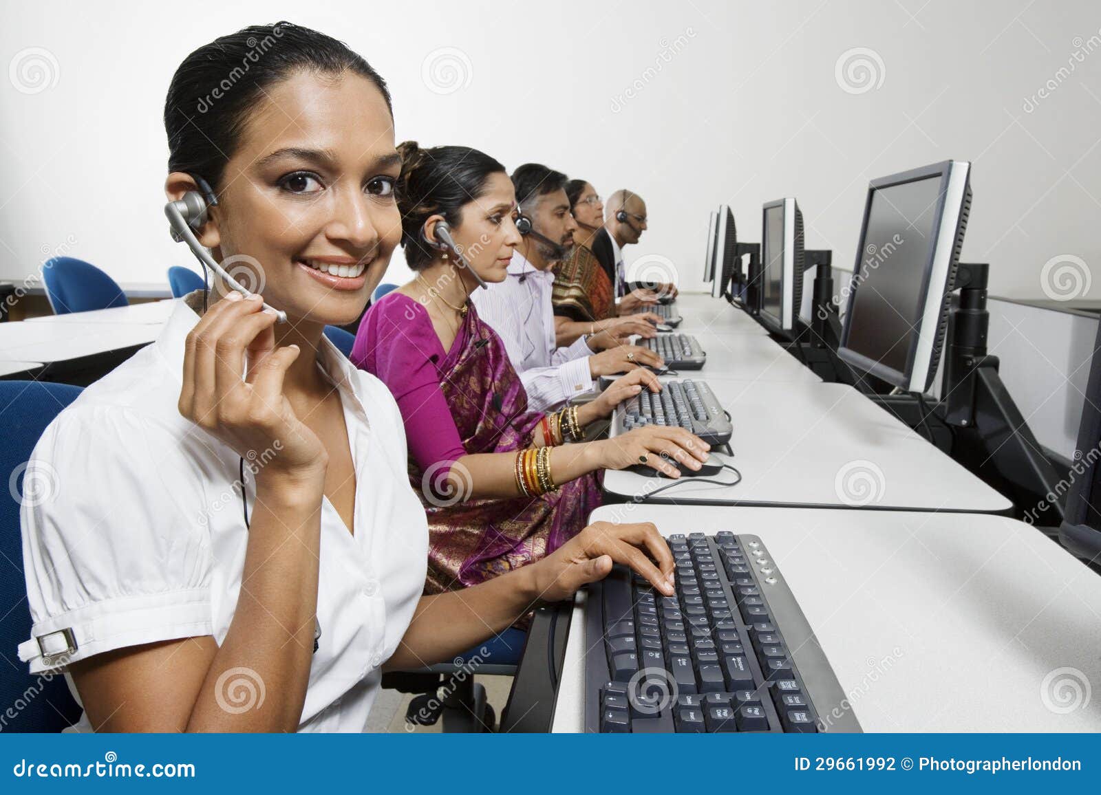 Customer Service Reps in Call Center Stock Photo - Image of headset ...
