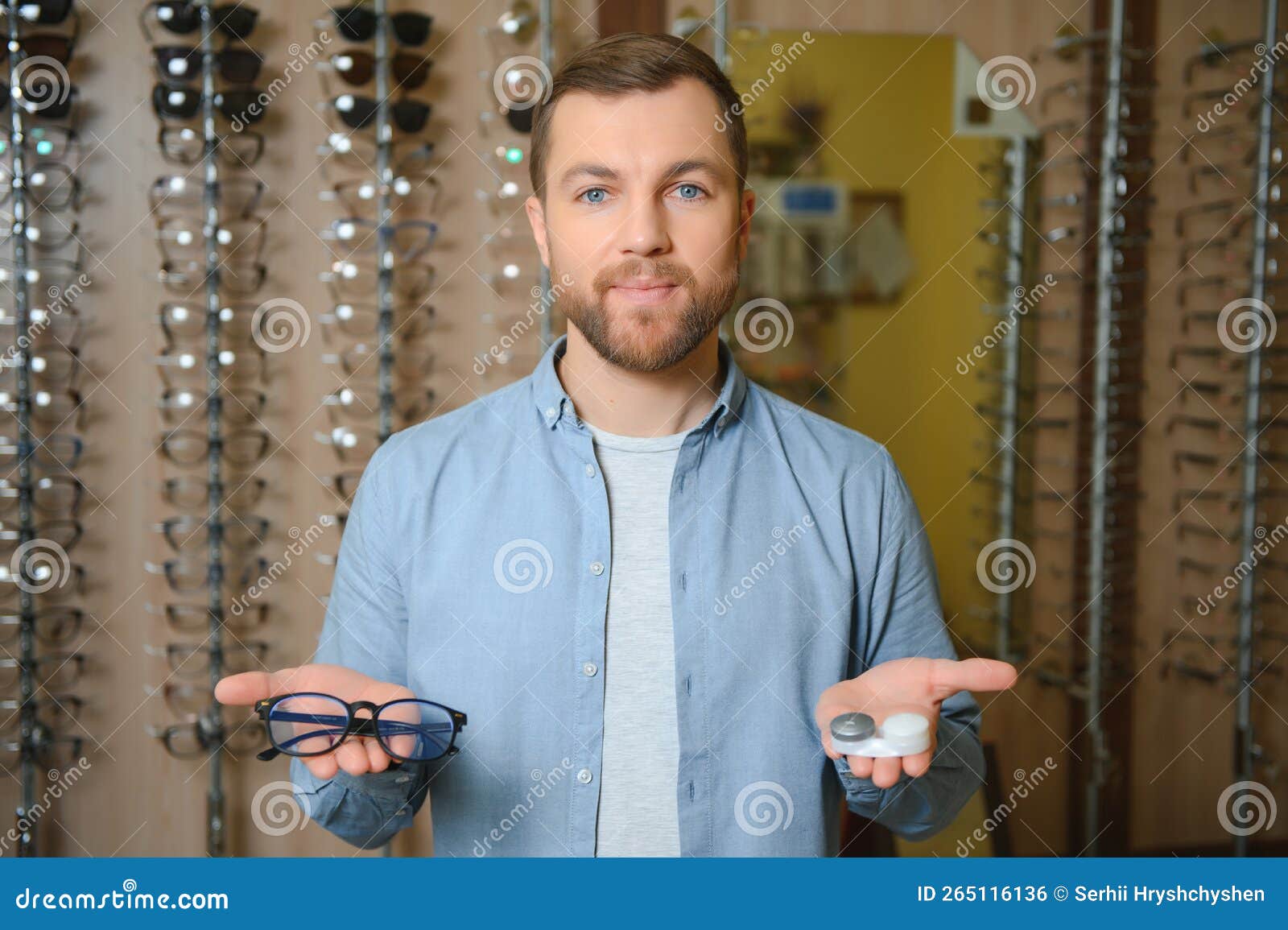 Customer Shoosing Spectacles at Optic Store. Stock Photo - Image of ...