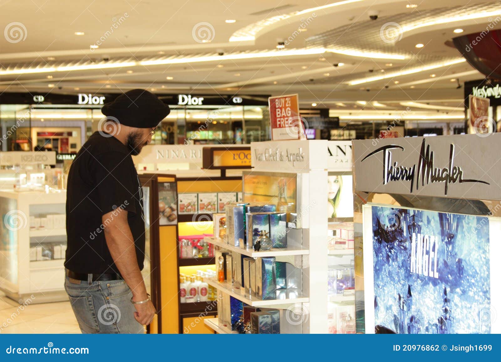 A Customer Shopping at a Perfume Counter Editorial Photography - Image ...