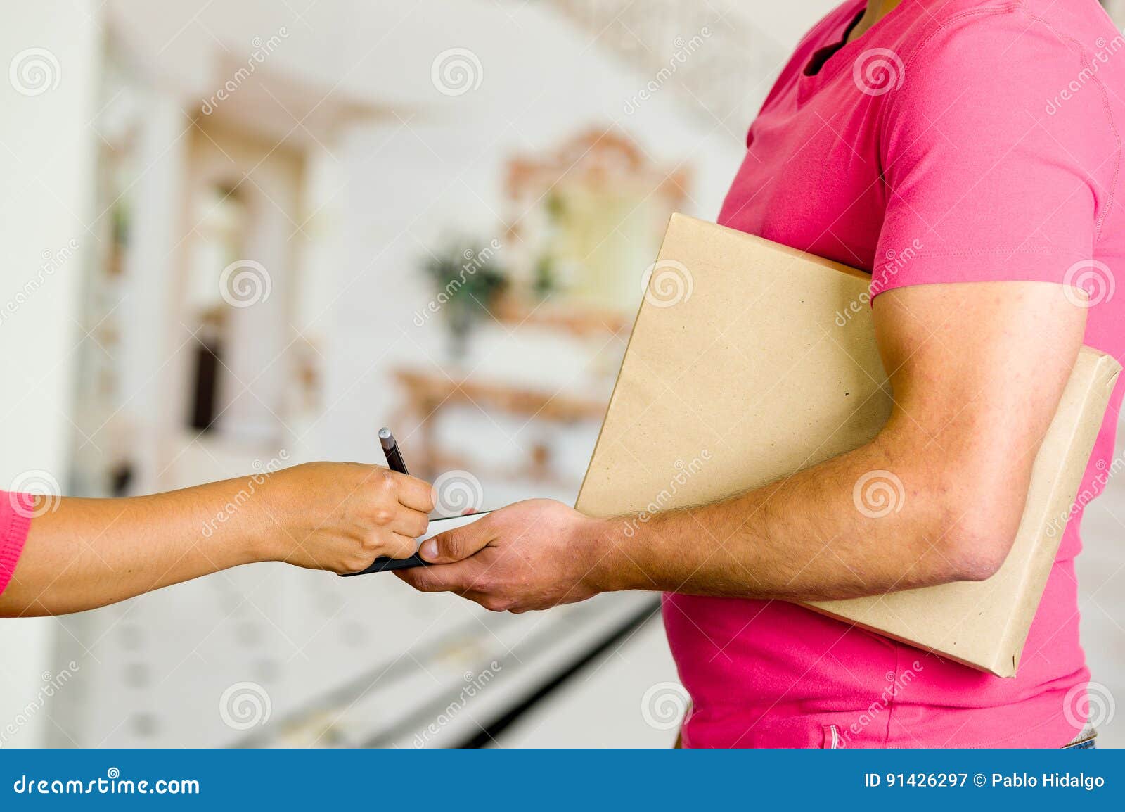 Customer Signing for Delivery from Courier Stock Image - Image of ...