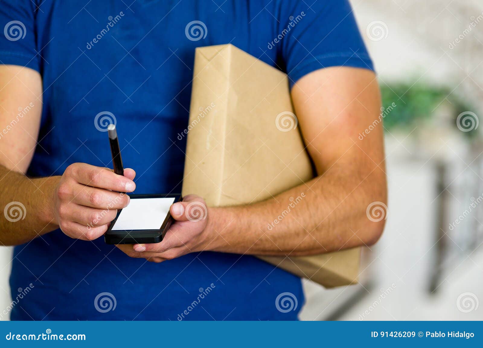 Customer Signing for Delivery from Courier Stock Image - Image of ...
