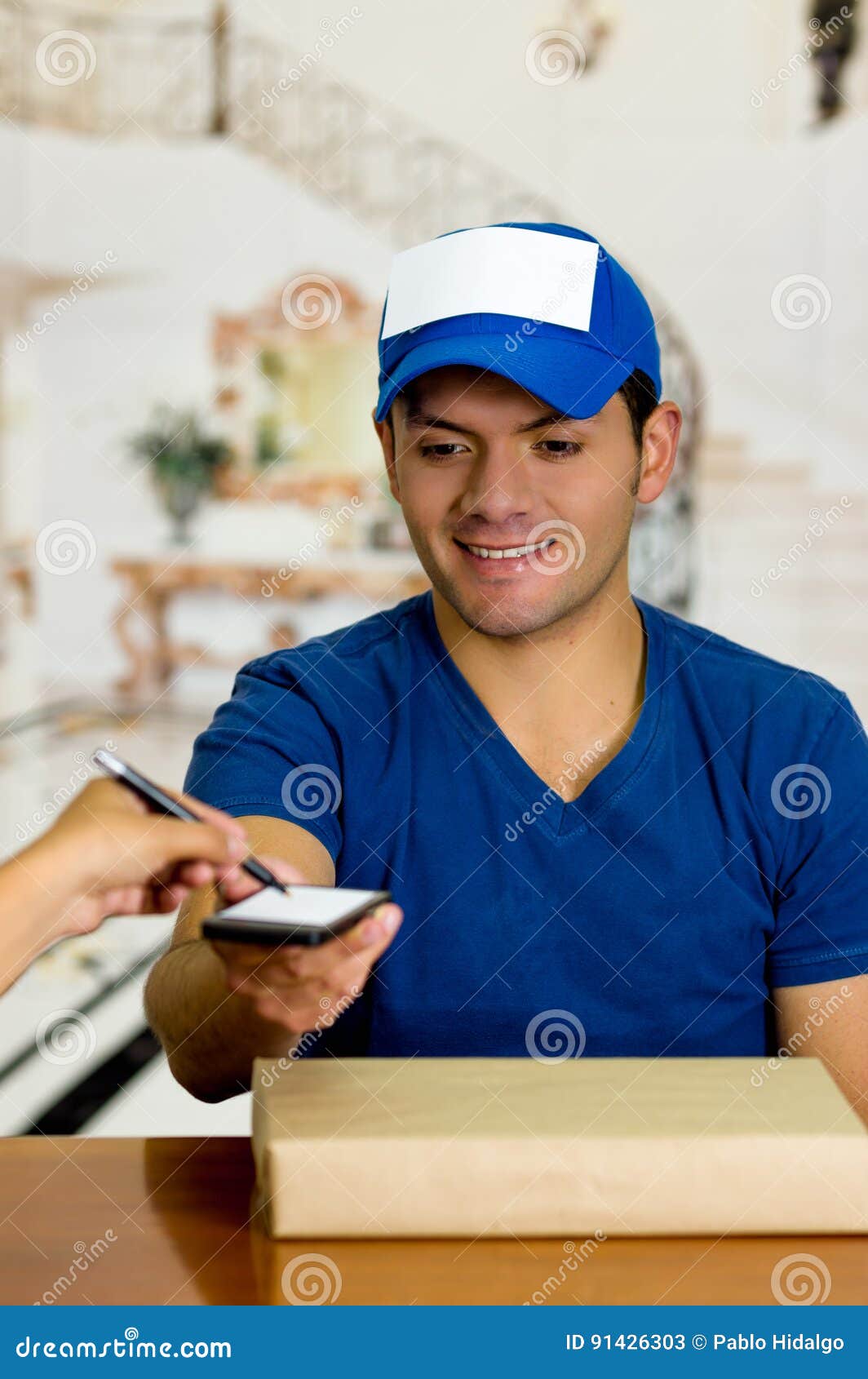 Customer Signing for Delivery from Courier Stock Image - Image of ...