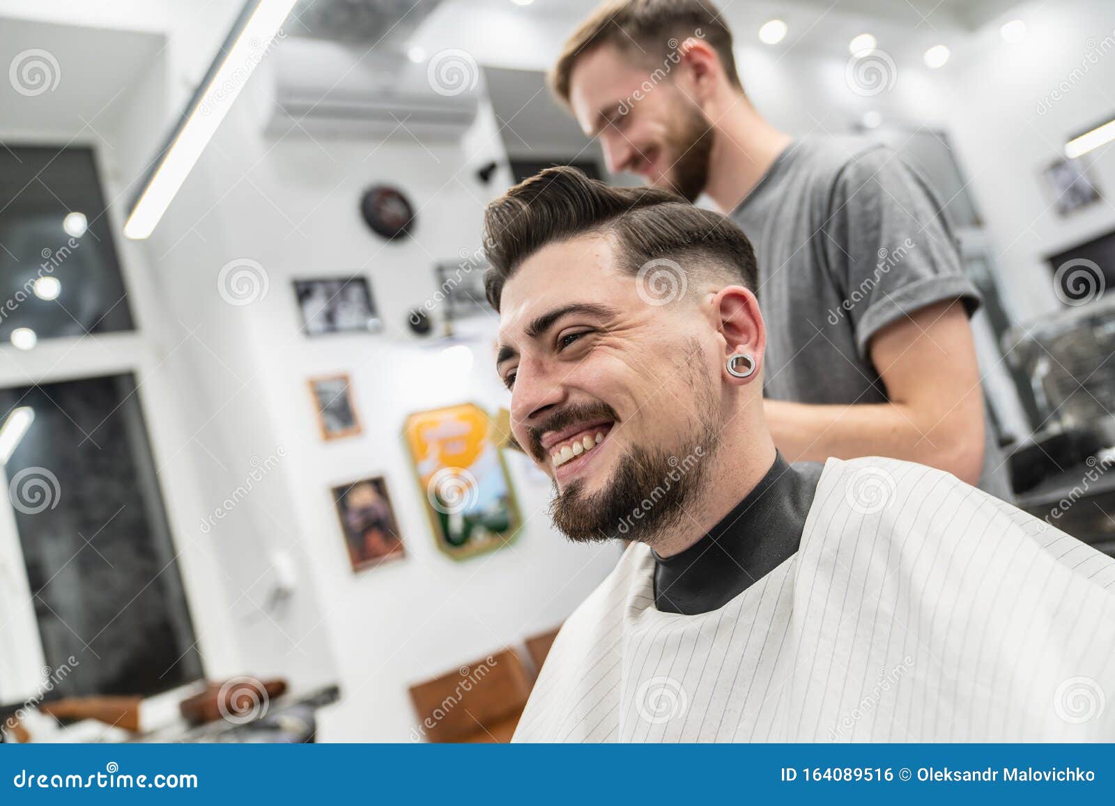 Customer Smiling in Barber Shop with Barber. Fun Barber Stock Photo ... Customer Smiling in Barber Shop with Barber. Fun Barber Stock Photo ...