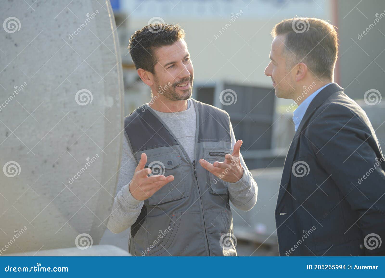 Customer Standing with Construction Worker Outside Stock Photo - Image ...