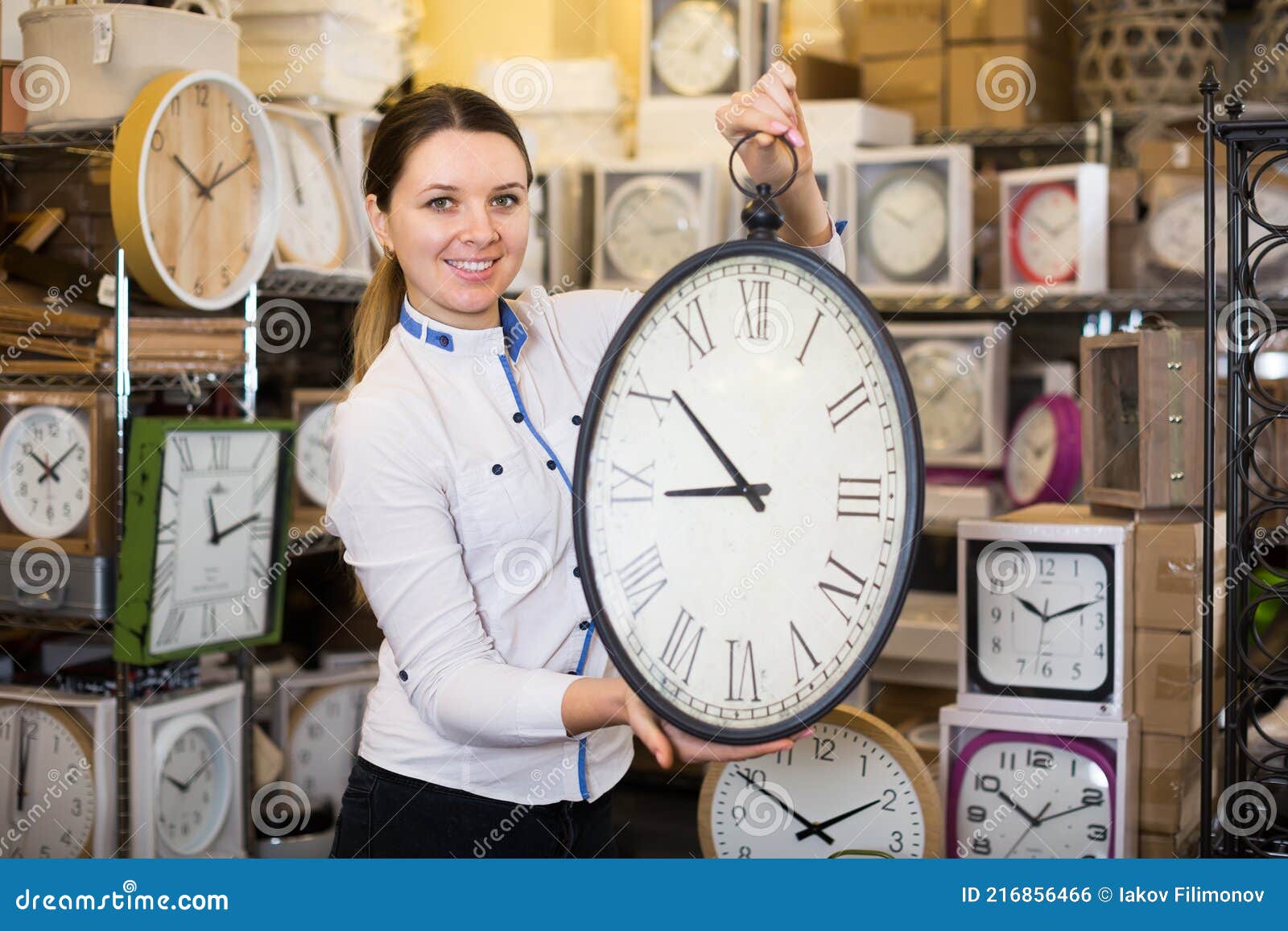 Customer is Standing with Wall Clock Stock Photo - Image of indoors ...