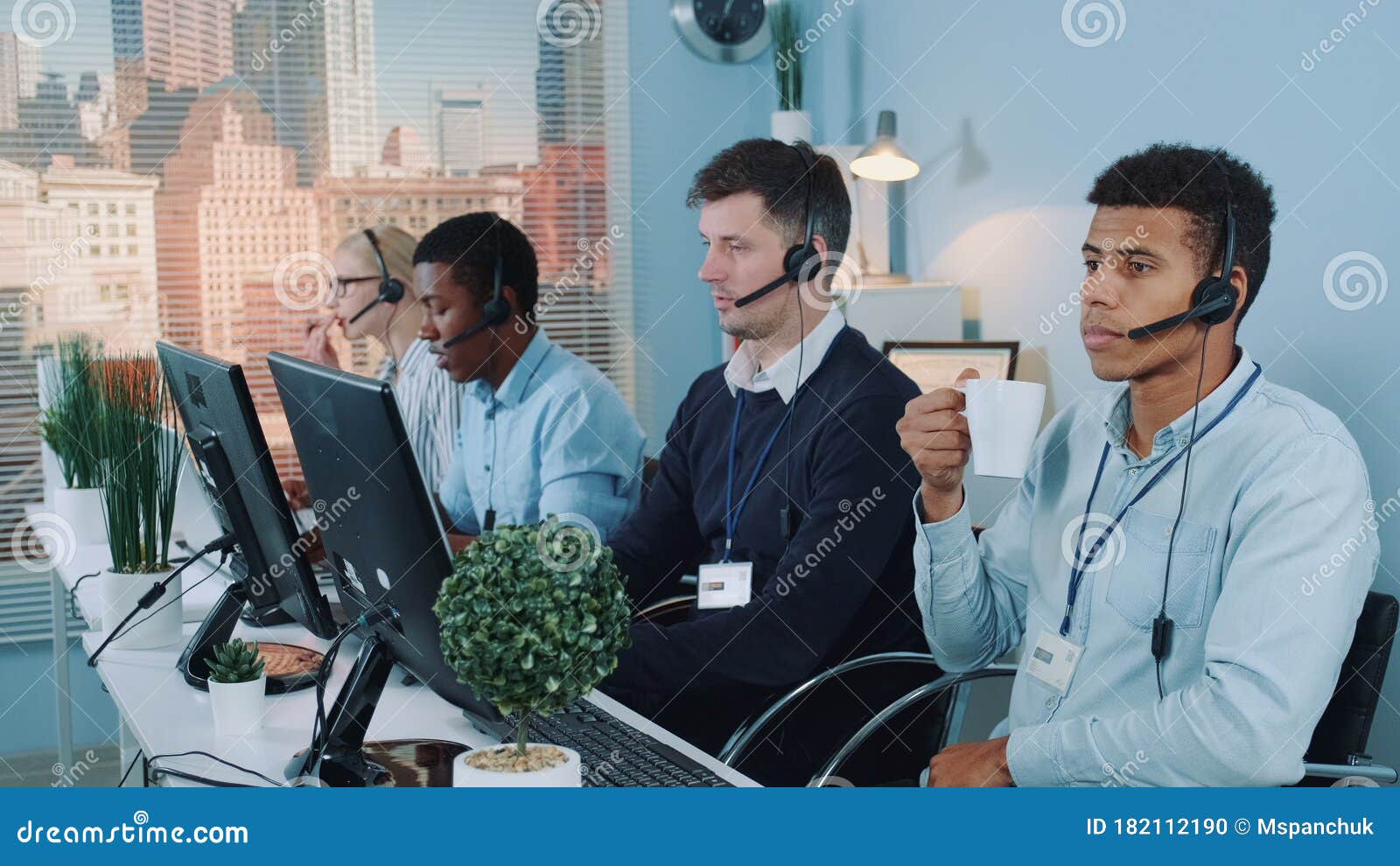 Customer Support Agent Drinks Tea and is Bored. Stock Photo - Image of ...