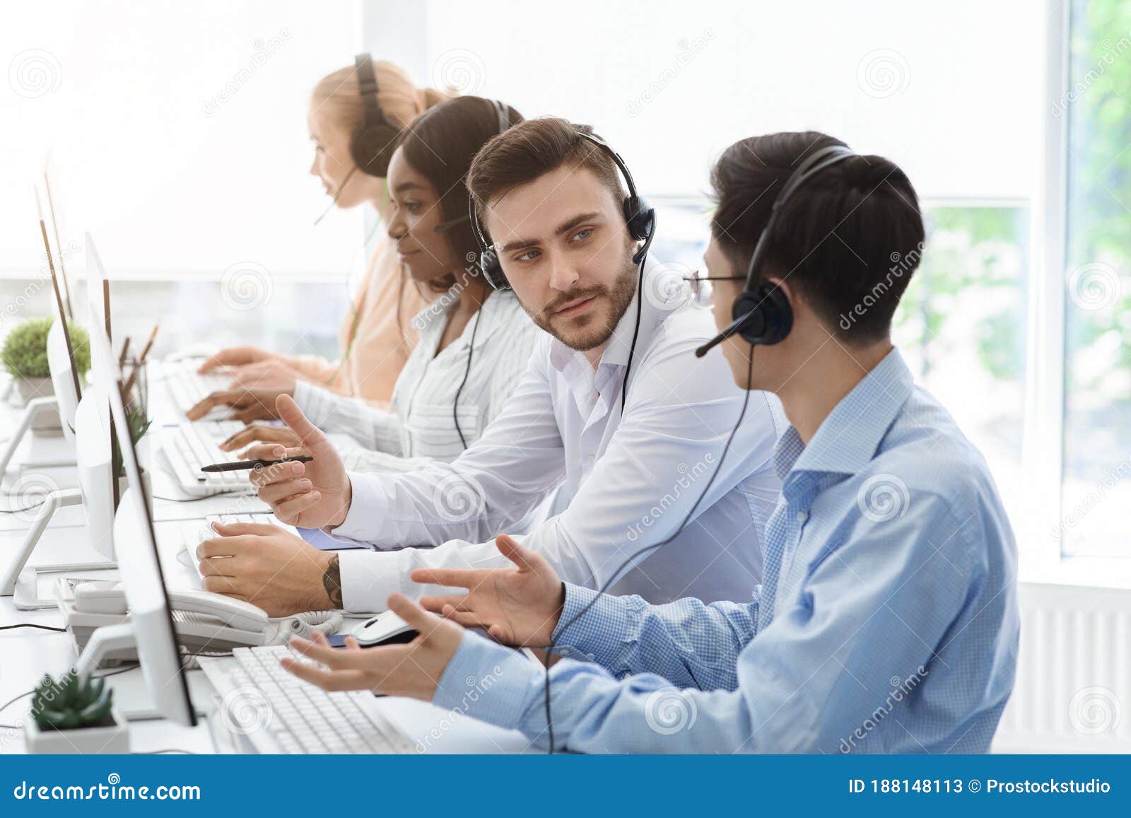 Customer Support Department Team at Work in Call Centre Office Stock ...