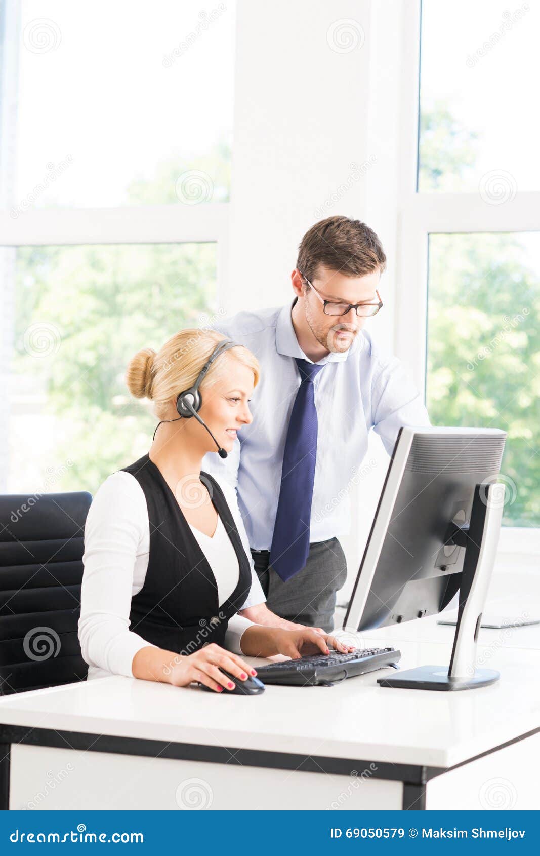 Customer Support Operators in Formalwear Working Using Computers Stock ...