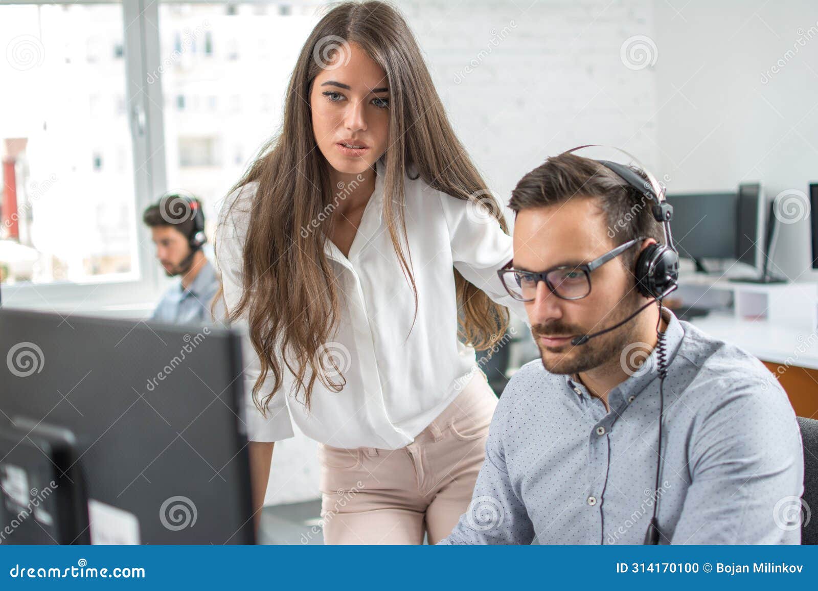 Customer Support Workers Solving Problems Together on Client& X27;s ...