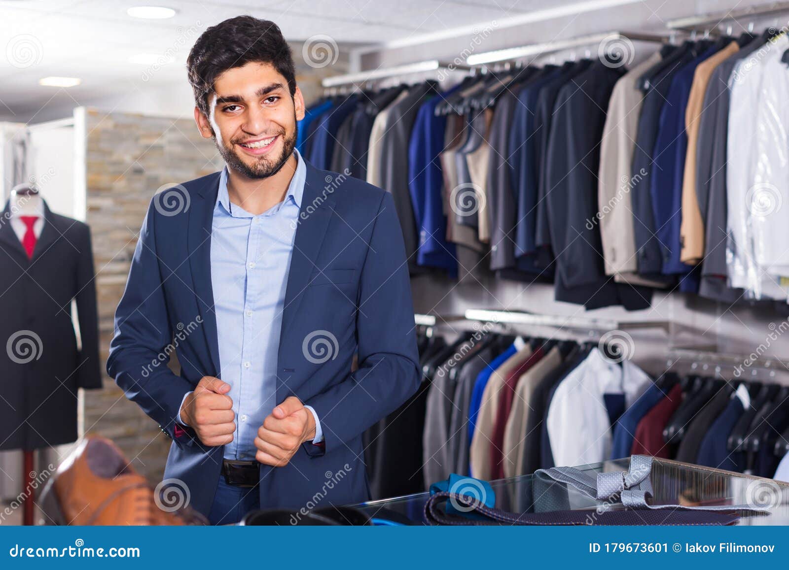 Customer is Trying on Jacket Stock Image - Image of colors, enjoyment ...