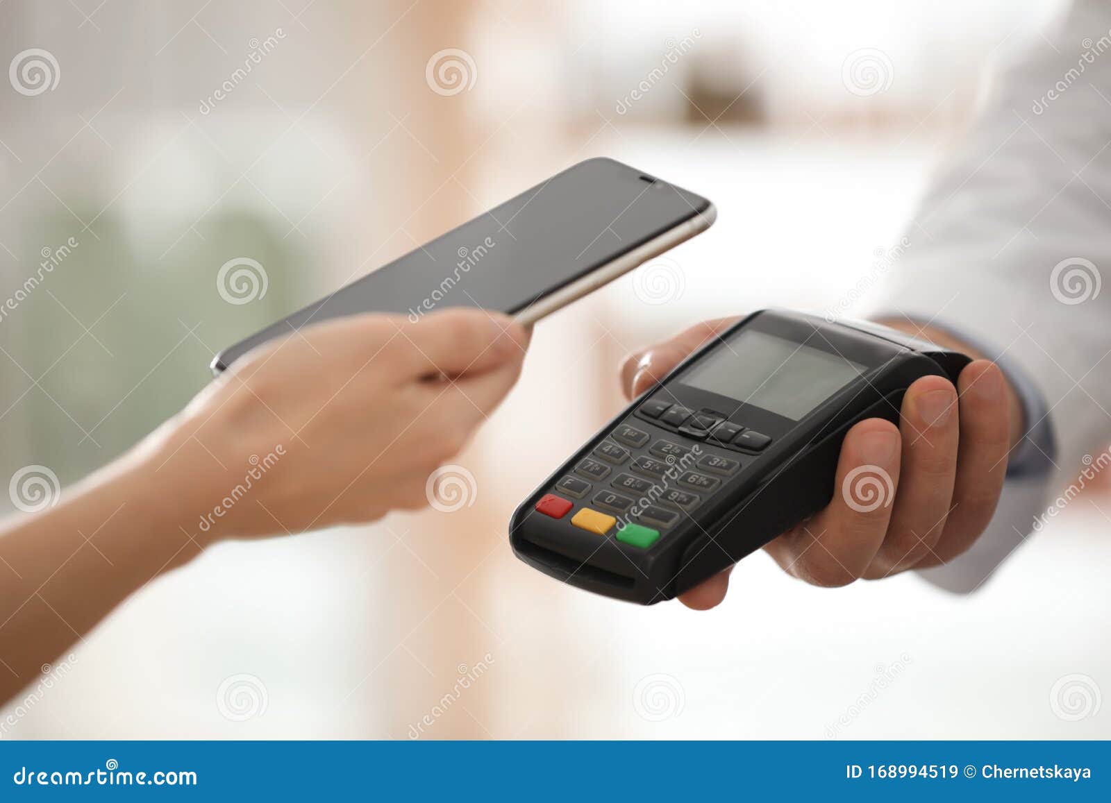 Customer Using Terminal for Contactless Payment with Smartphone in ...