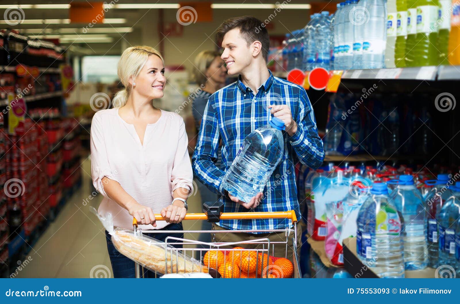 Customers Choosing Bottle of Water Stock Image - Image of drinks, male ...