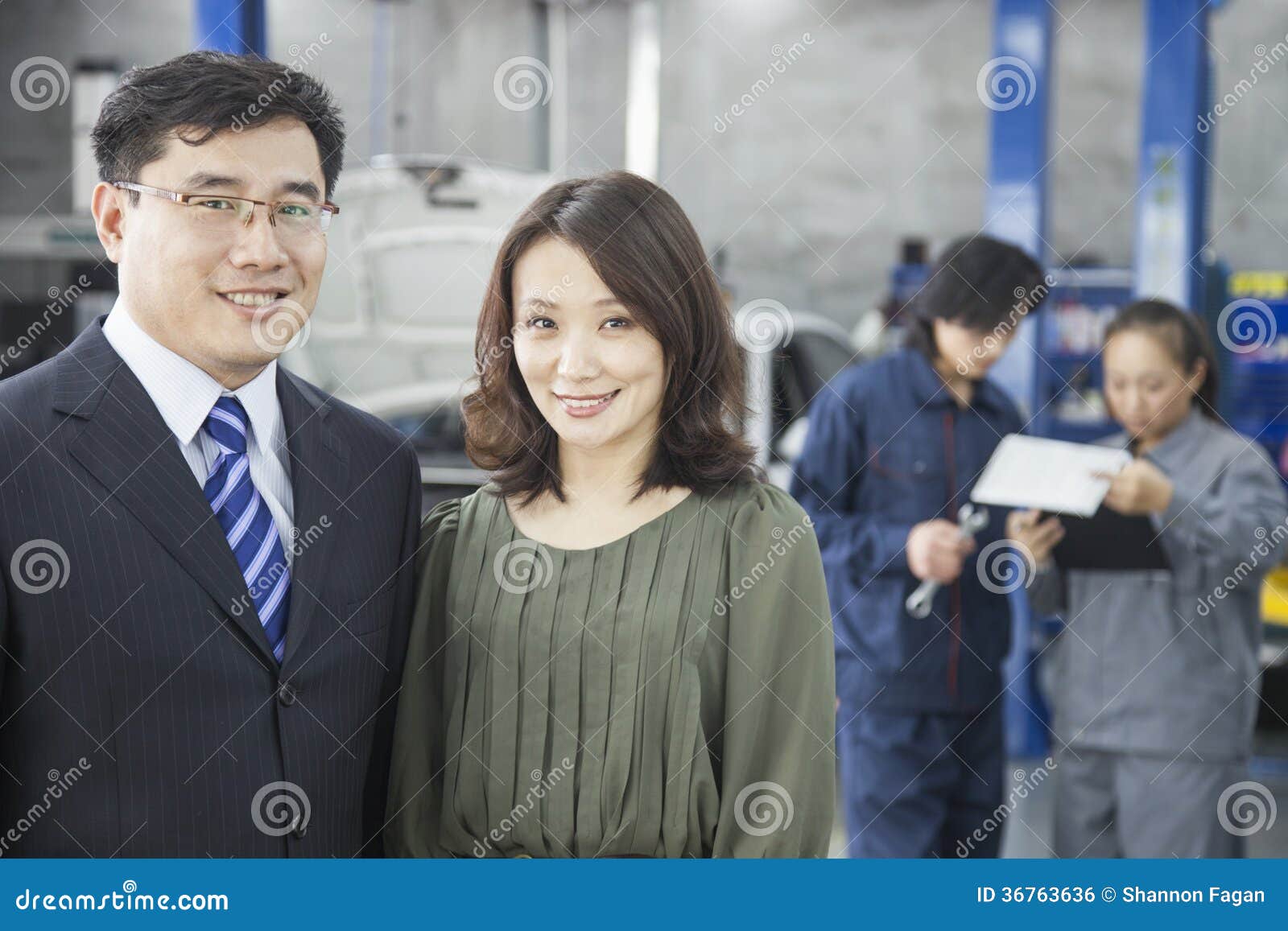 Customers and Mechanics in Auto Repair Shop Stock Photo - Image of ...