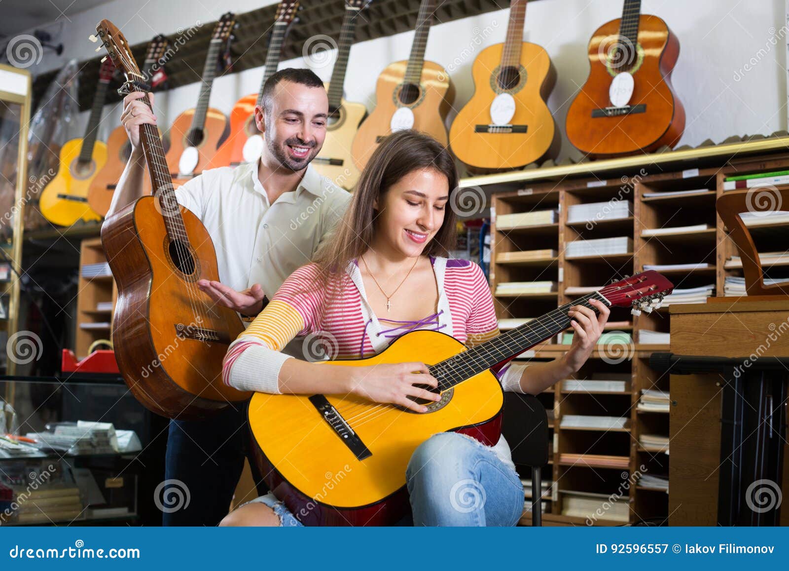 Customers in Music Instruments Shop Stock Image - Image of clients ...
