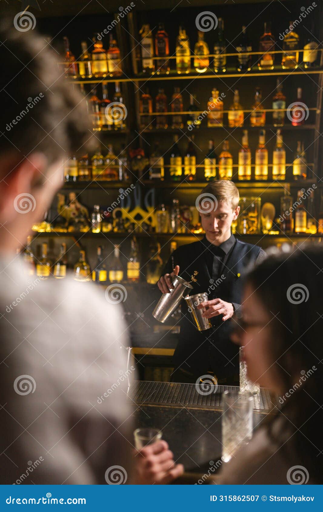 Customers Sit at Bar Waiting for Drinks from Bartender Stock Image ...