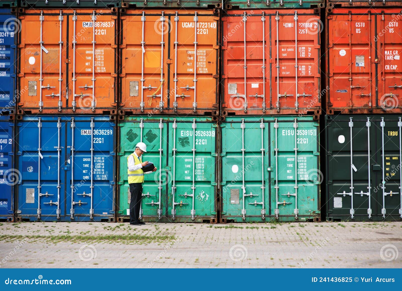 Concentration and Hard Work is Key. a Customs Inspector Standing and ...