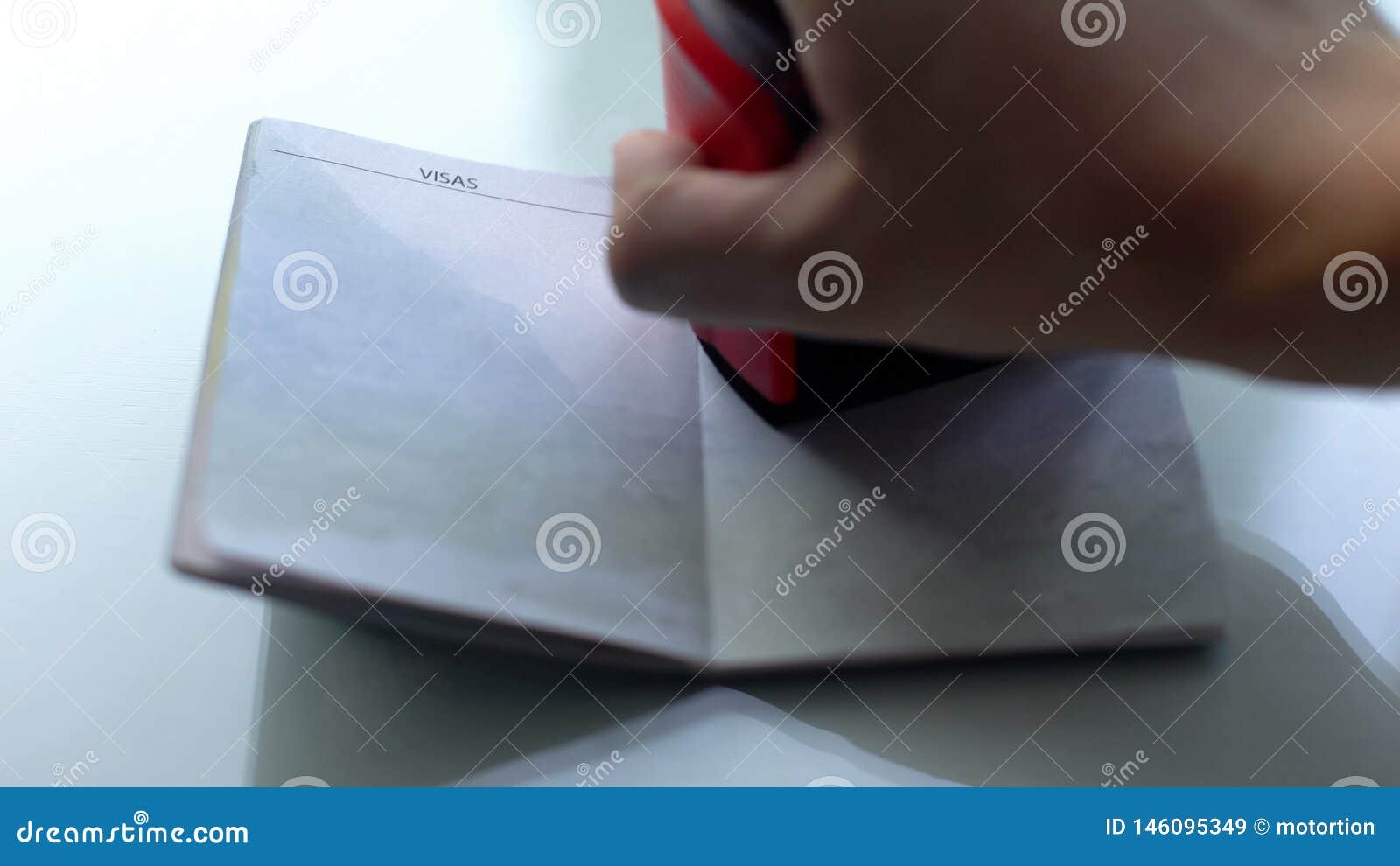 Customs Officer Hand Stamping Rectangular Seal in Passport, Travelling ...