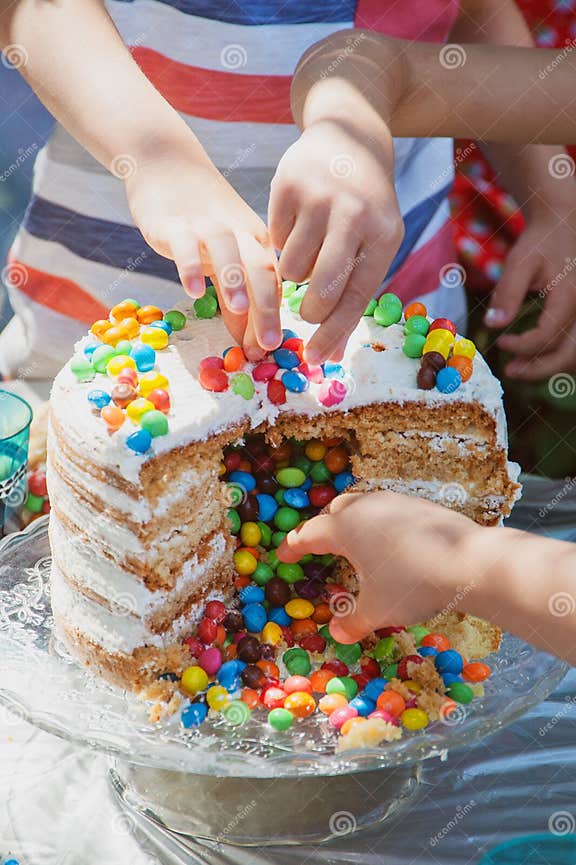 Cut Cake with Candy Stuffing Stock Photo - Image of child, children ...