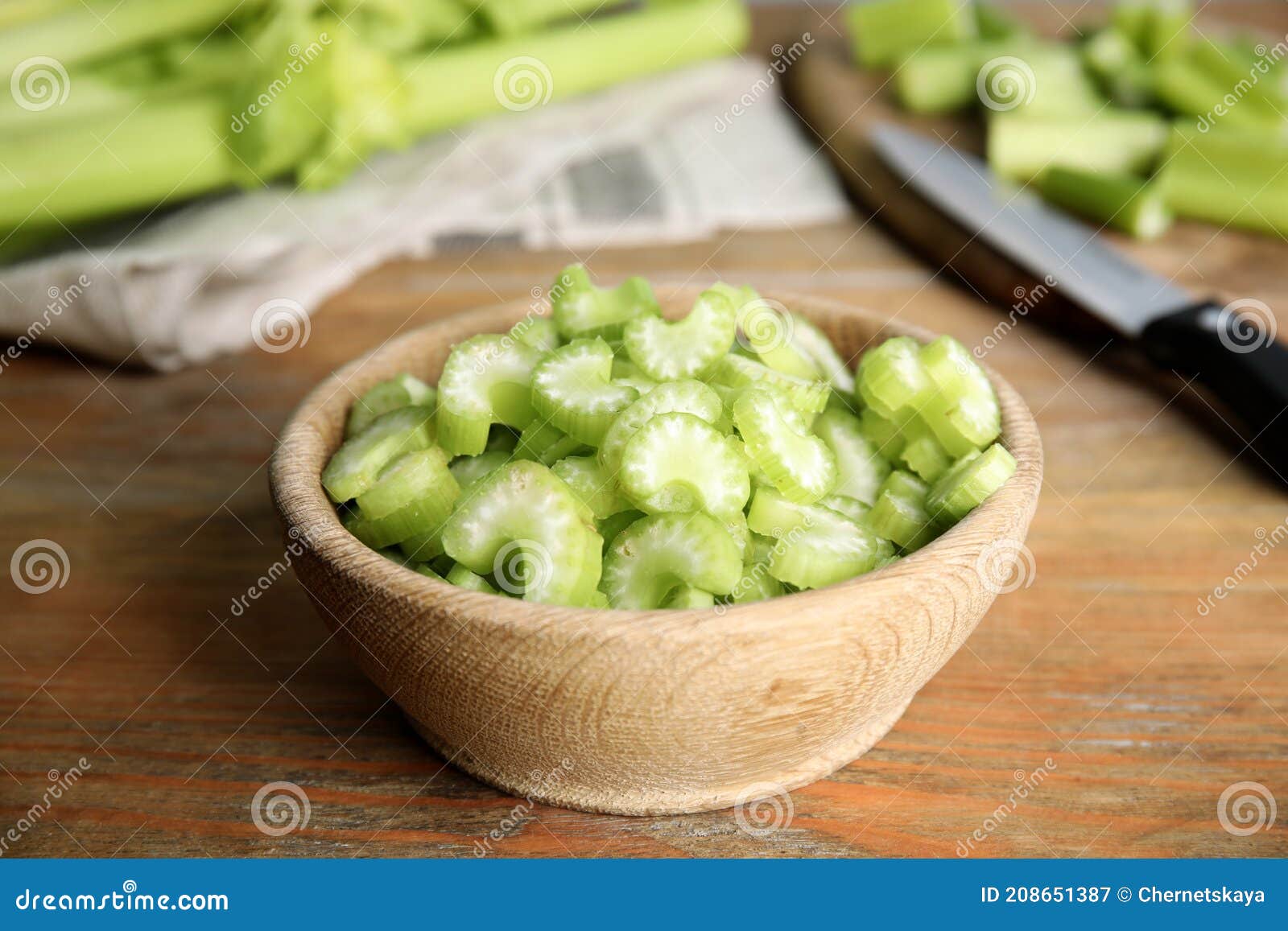 Cut Celery in Bowl on Wooden Table Stock Image - Image of organic ...