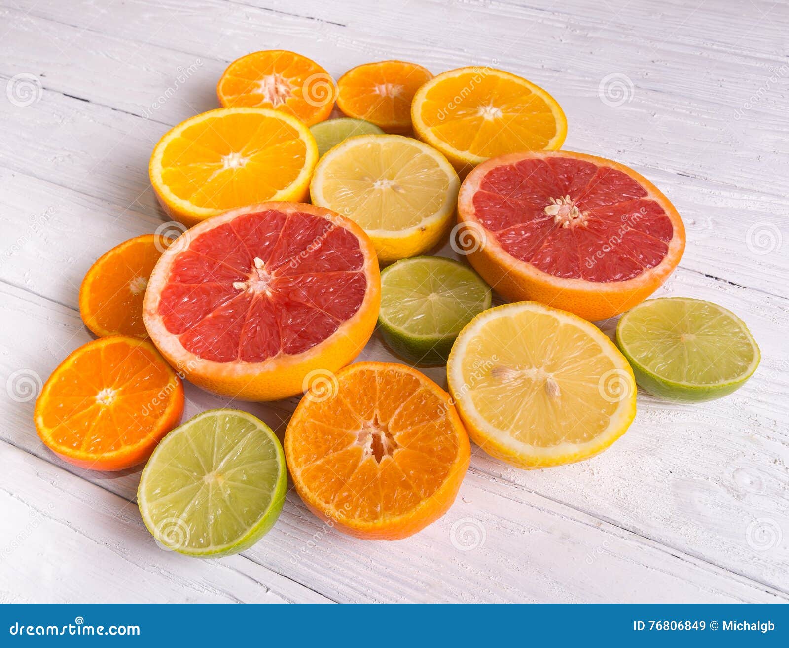 Cut Citrus Fruits On A Background Of White Boards Royalty-Free Stock ...