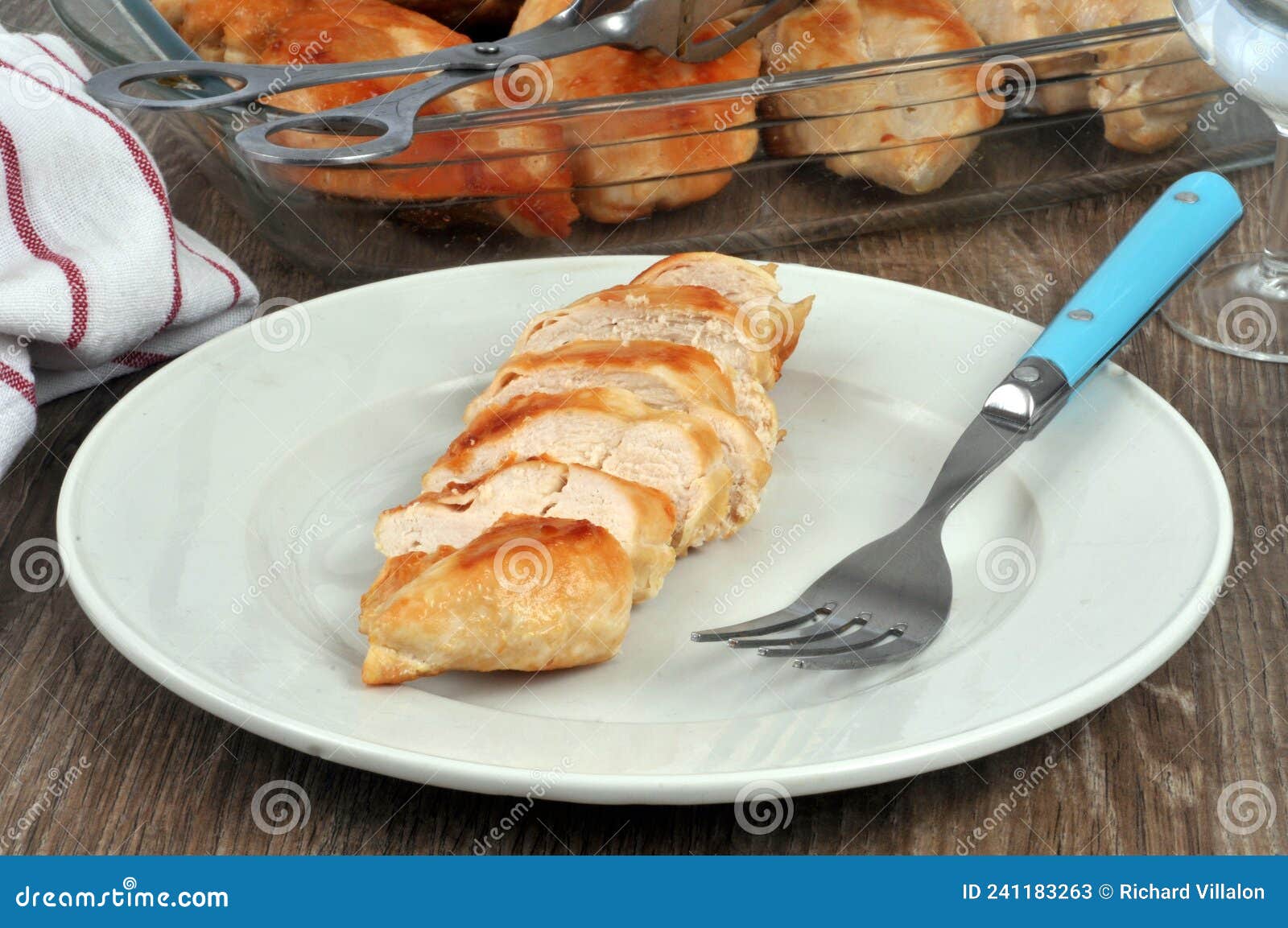 Cut Cooked Chicken Breast on a Plate with a Fork Stock Image - Image of ...